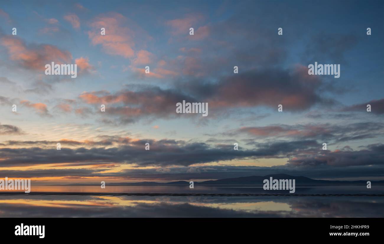 Epic sunset landscape image of Solway Firth viewed from Silloth during ...