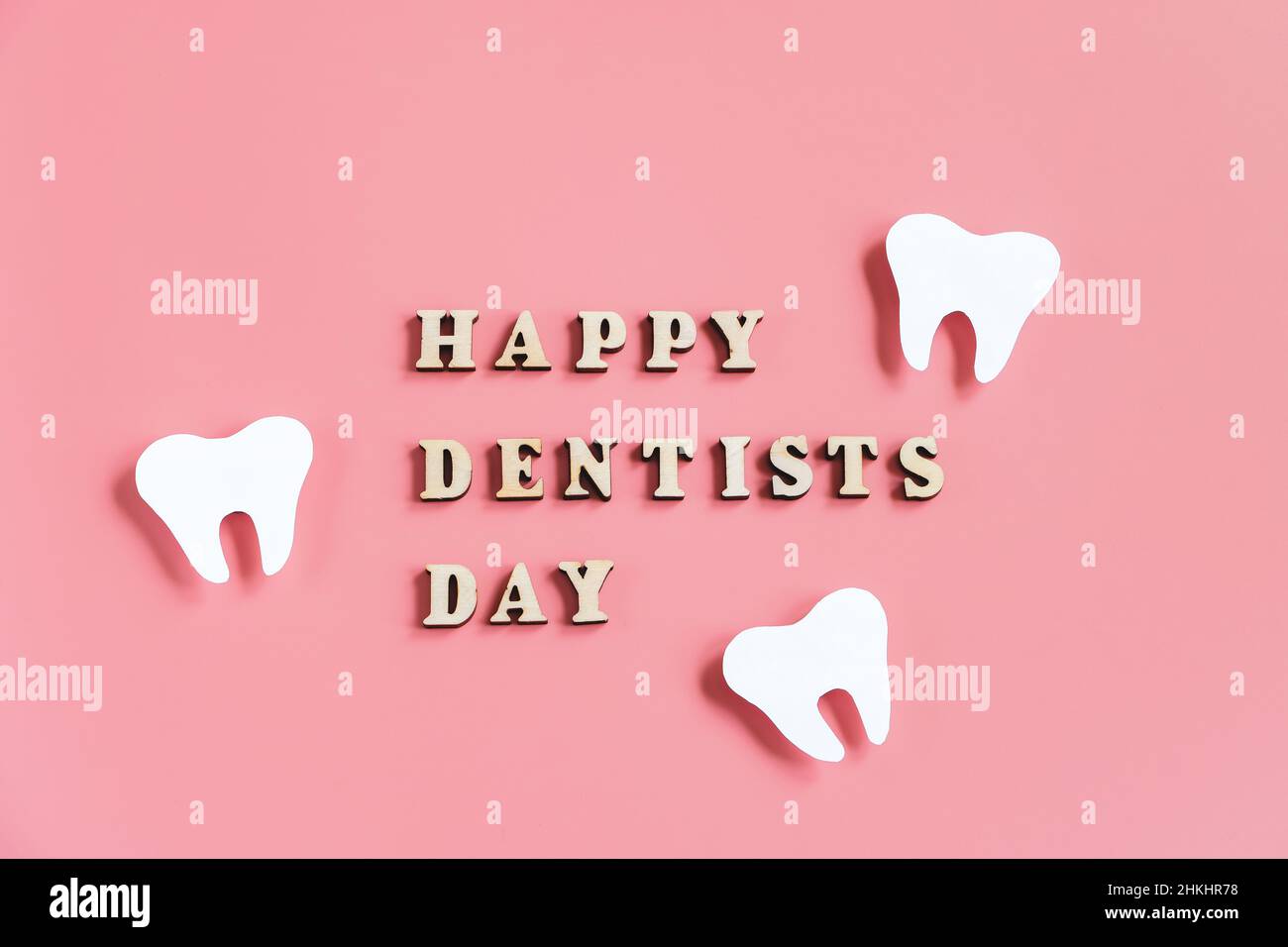 Paper cut mockup of tooth on pink background. Happy dentist day. Dental care concept Stock Photo ...