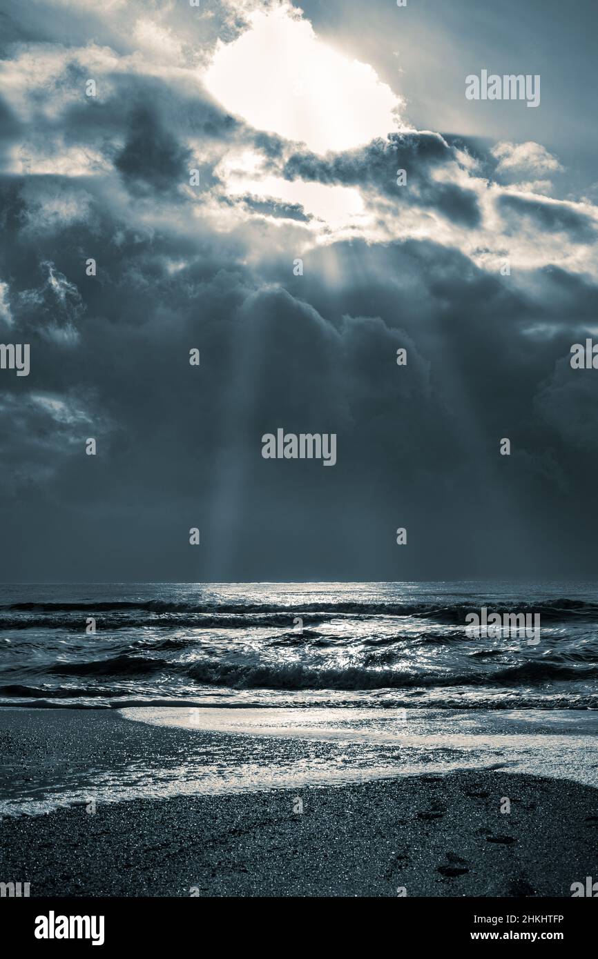 Dramatic seascape. Sea with waves and dark cloudy sky Stock Photo - Alamy