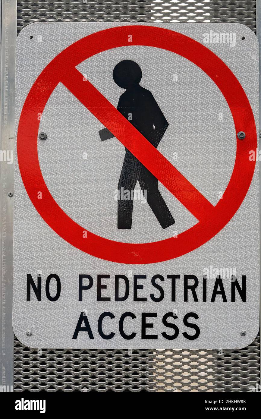 Signage indicating no pedestrian access with symbols Stock Photo - Alamy