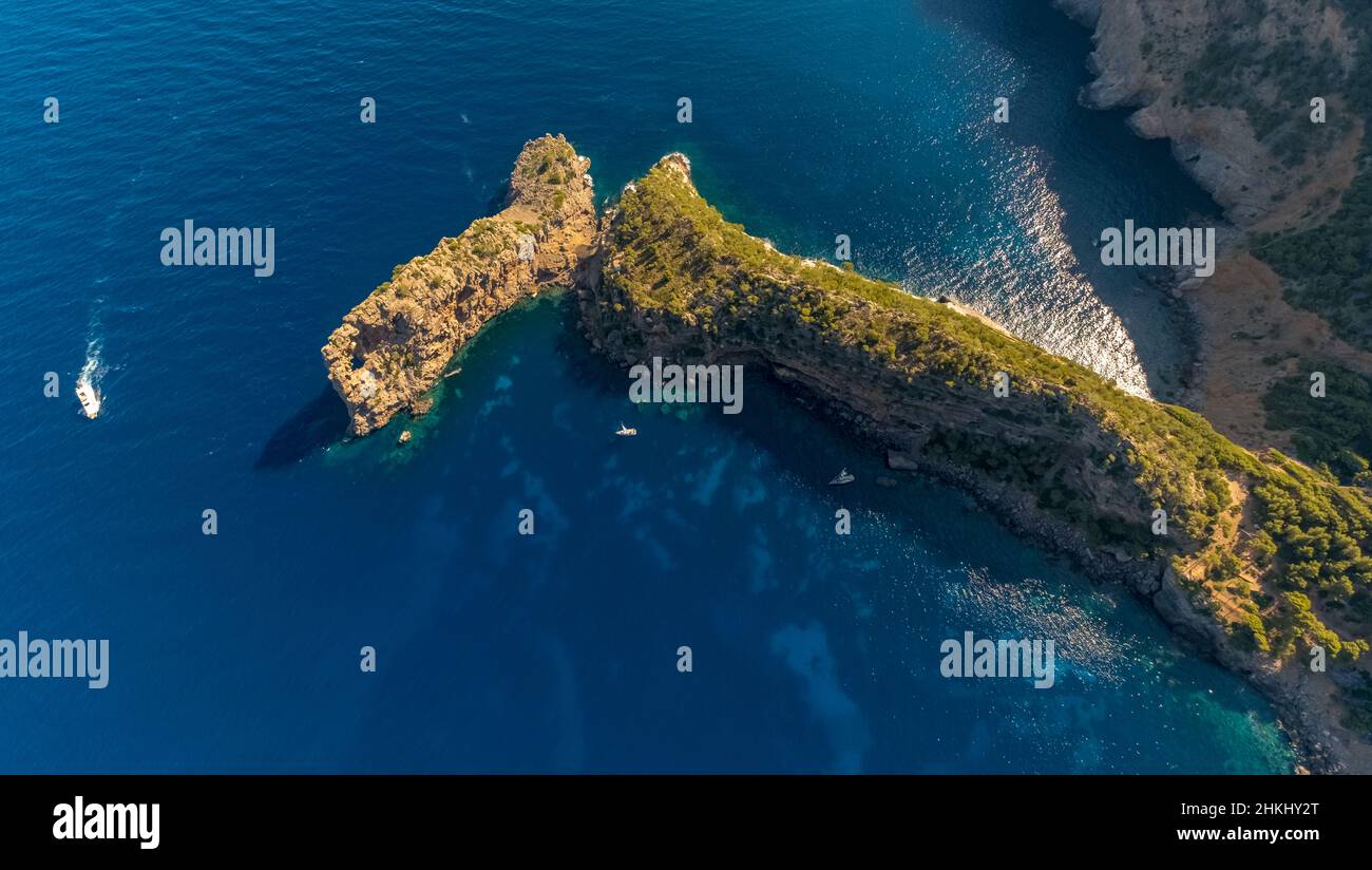 Aerial view, headland Punta de Sa Foradada with hole in the rock ...