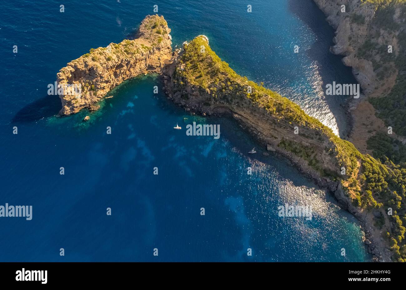 Aerial view, headland Punta de Sa Foradada with hole in the rock ...