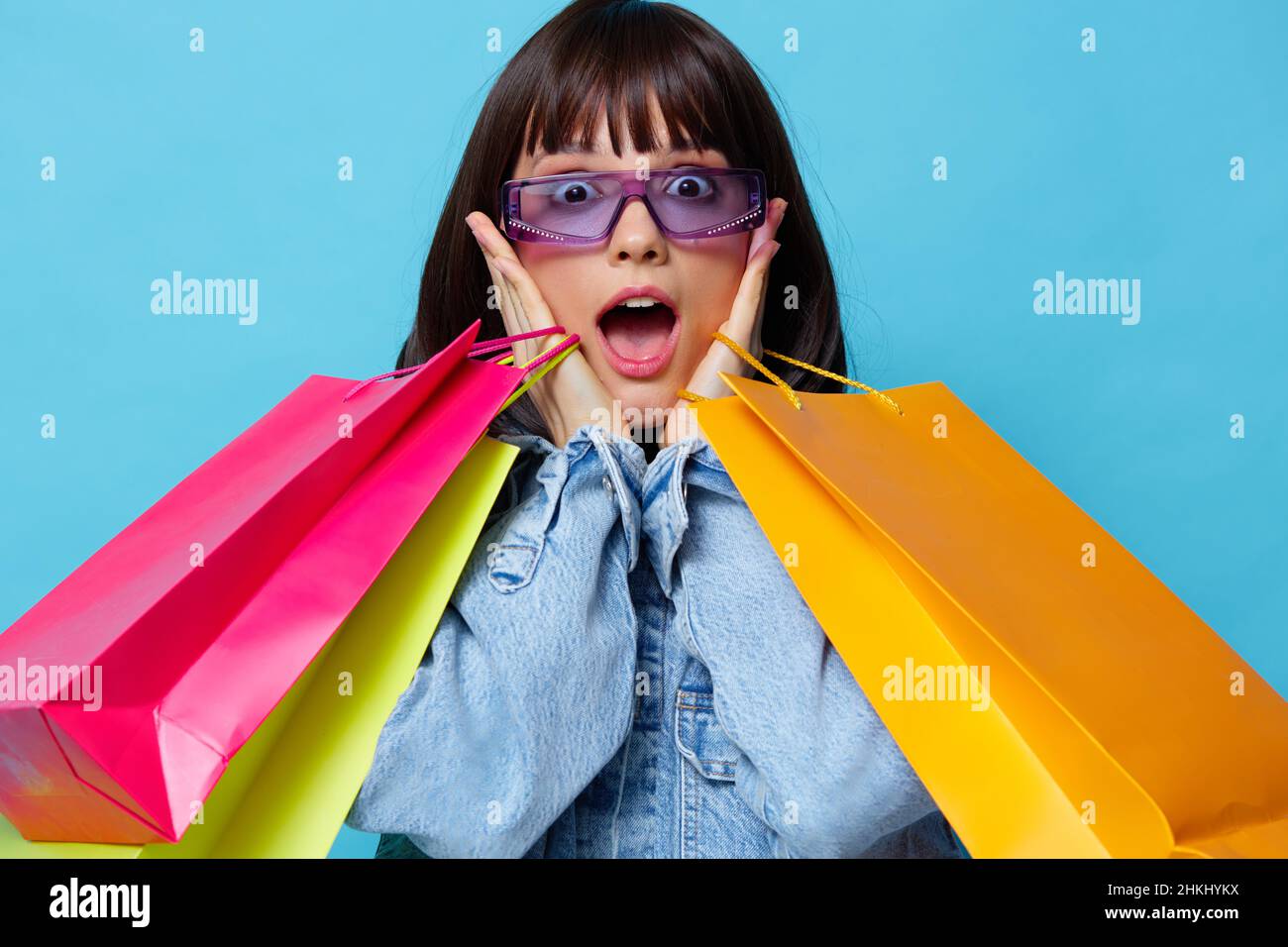 young woman in sunglasses shopping emotions posing joy Lifestyle ...