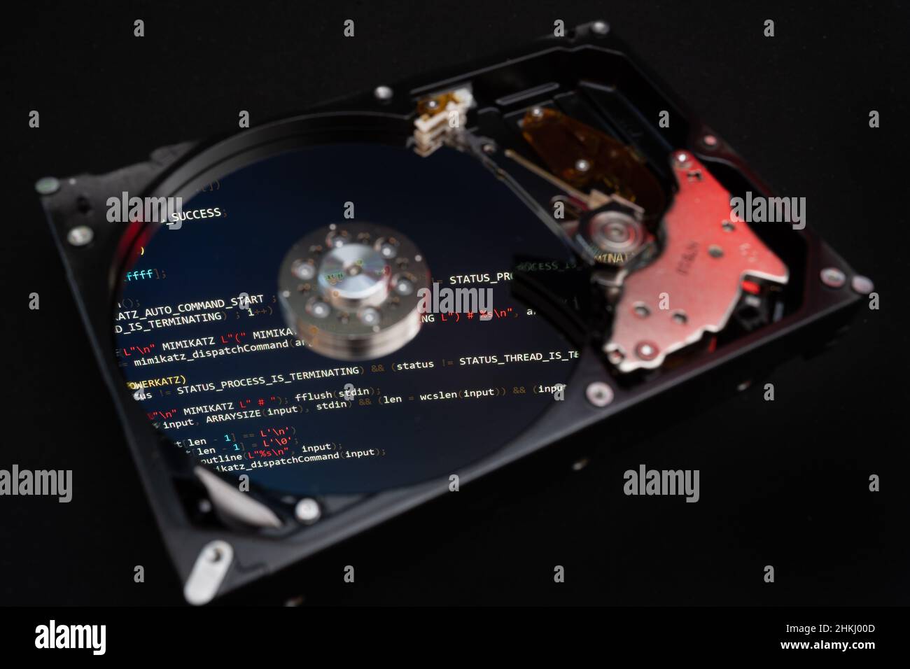 Code reflected on a disassembled HDD Stock Photo - Alamy