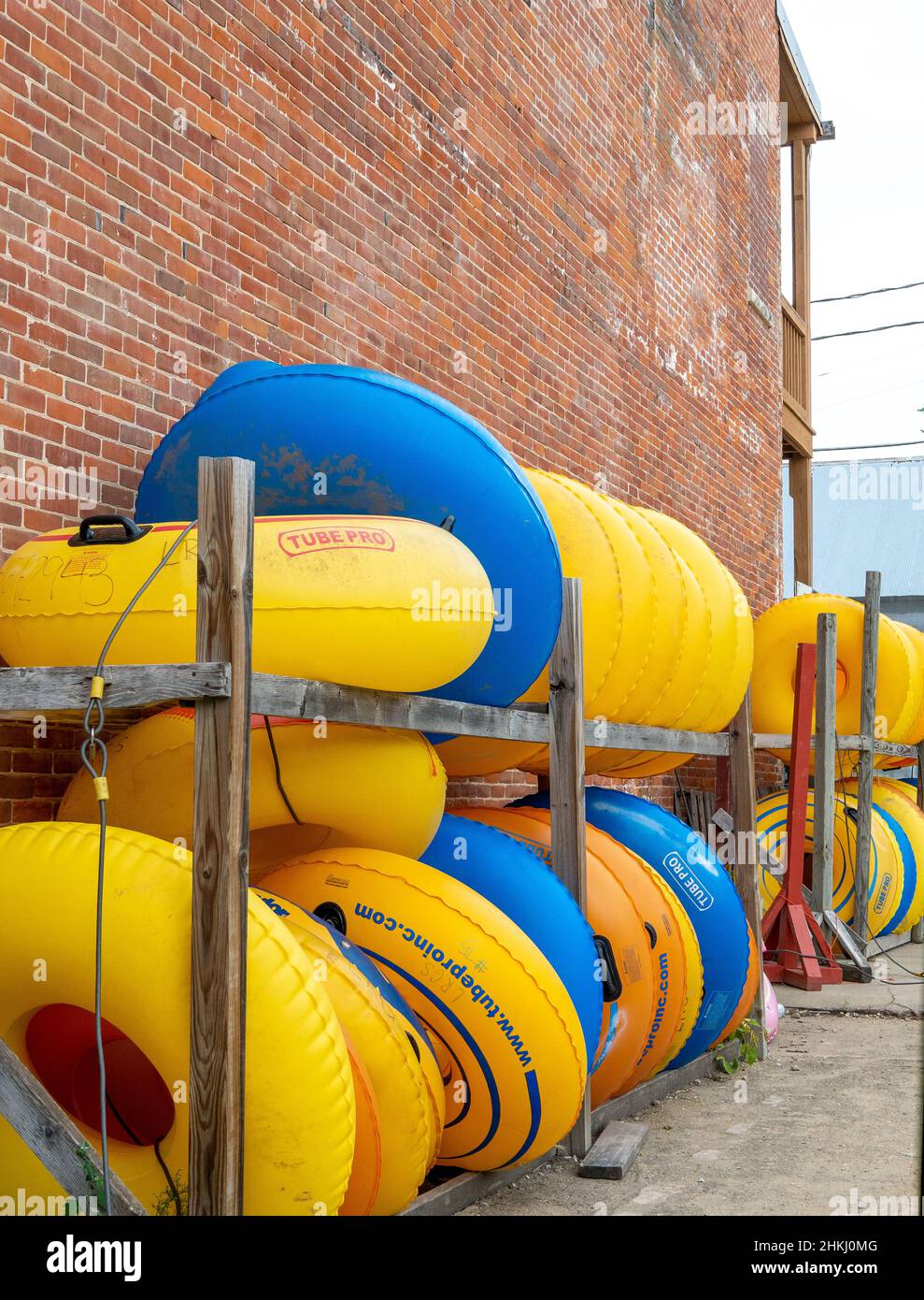 LANESBORO, MN - 26 AUG 2019: Stacks of yellow and blue inner tubes ...
