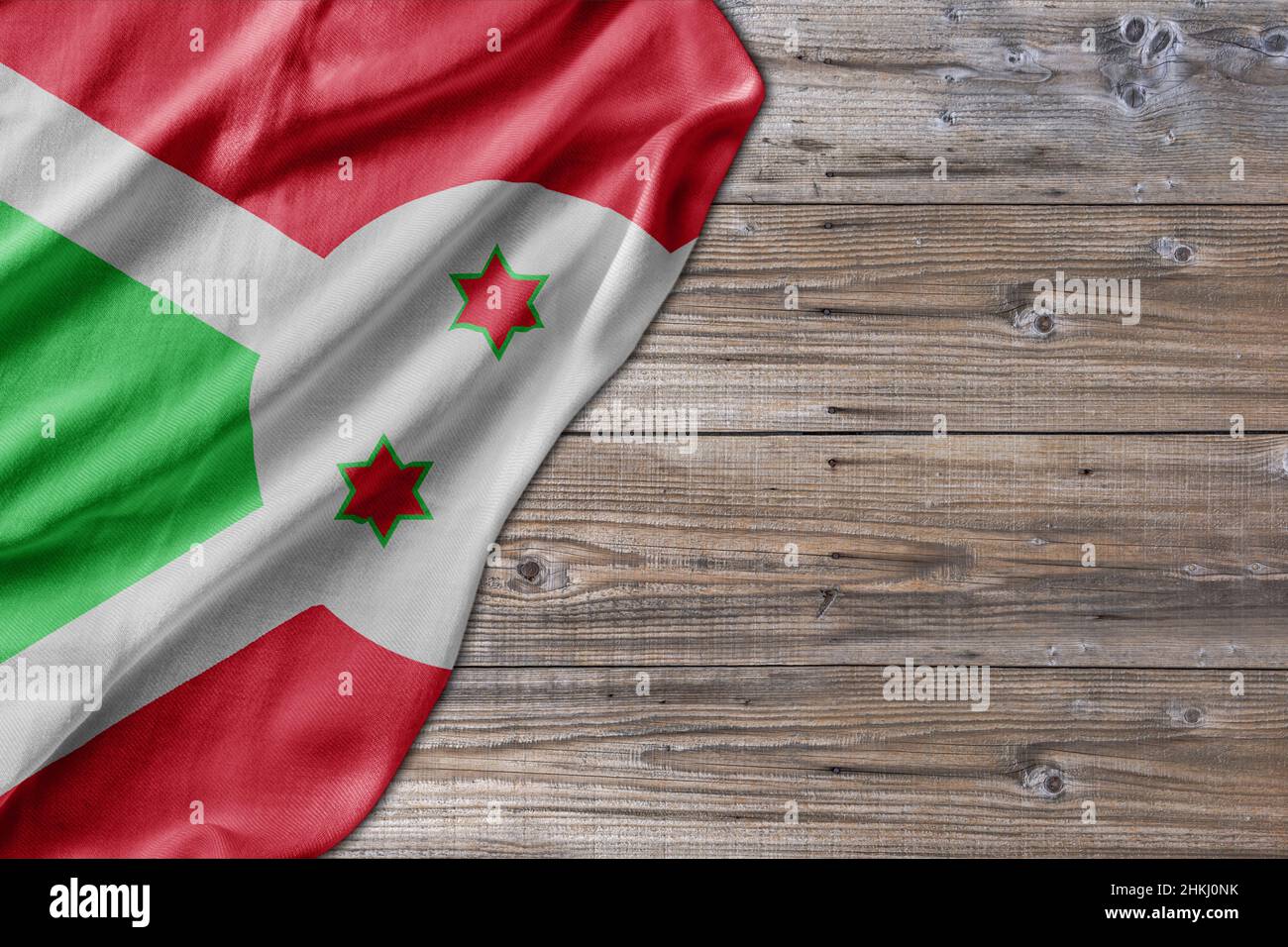 Wooden pattern old nature table board with Burundi flag Stock Photo - Alamy