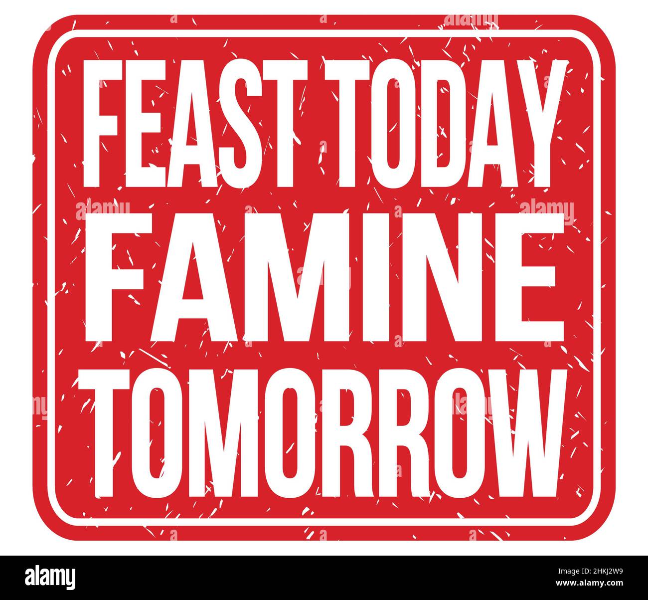 FEAST TODAY FAMINE TOMORROW, text written on red stamp sign Stock Photo ...