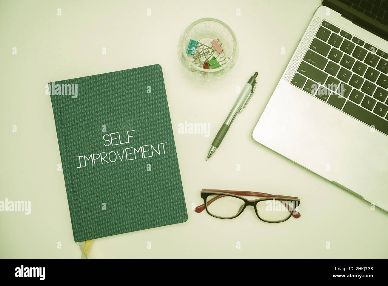 Hand writing sign Self Improvement. Word for process of making yourself ...
