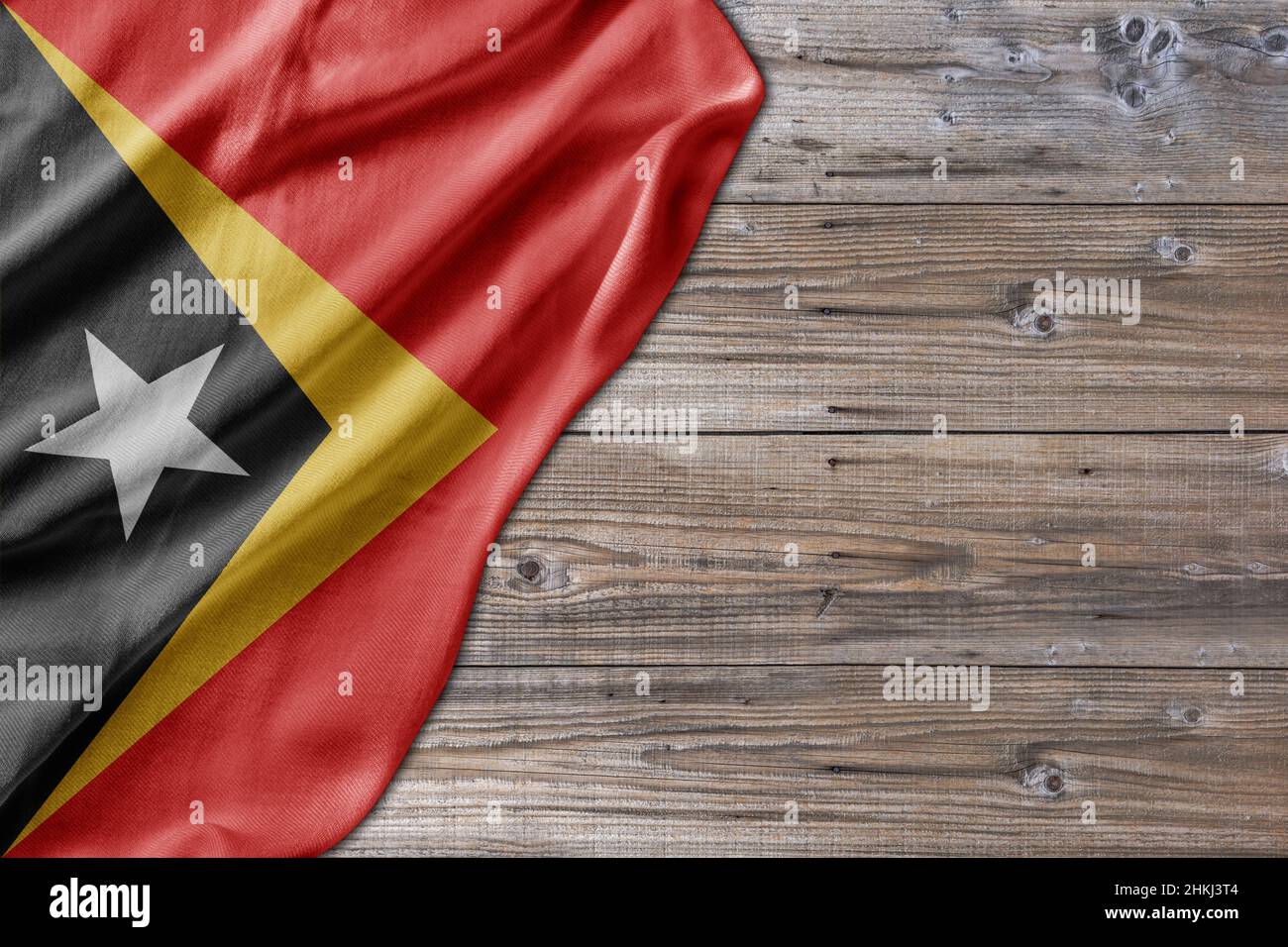 Wooden pattern old nature table board with East Timor flag Stock Photo ...
