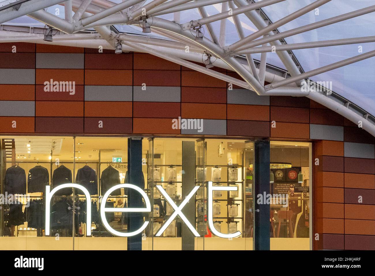 A close-up of a Next store sign in Newport, Wales Stock Photo - Alamy