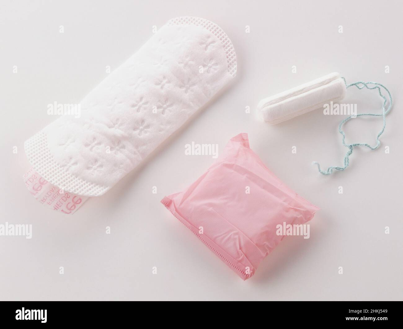 Pantyliner, packed sanitary pad and tampon Stock Photo - Alamy