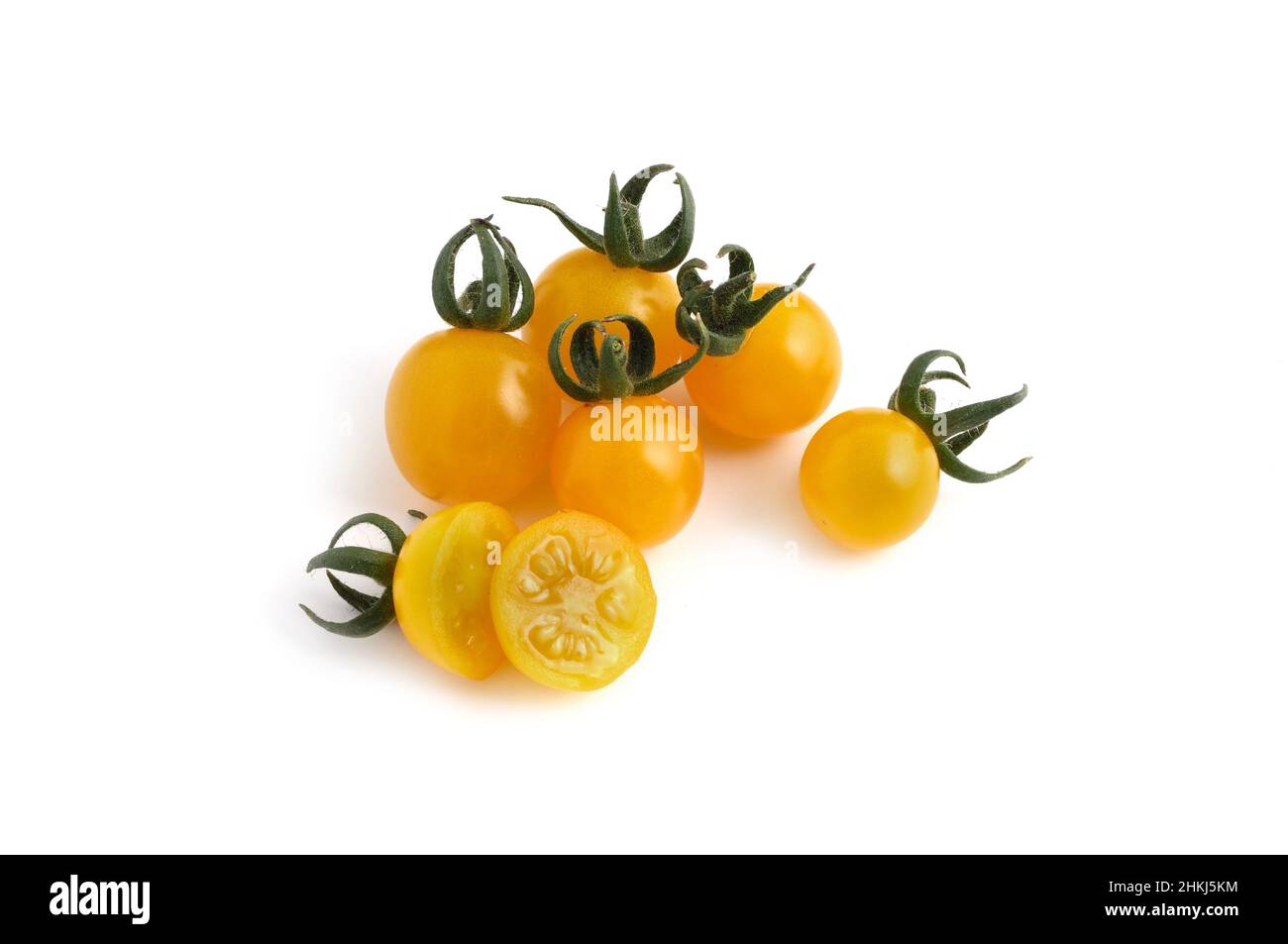 Whole and sliced 'Broad Ripple Yellow Currant' tomatoes Stock Photo - Alamy