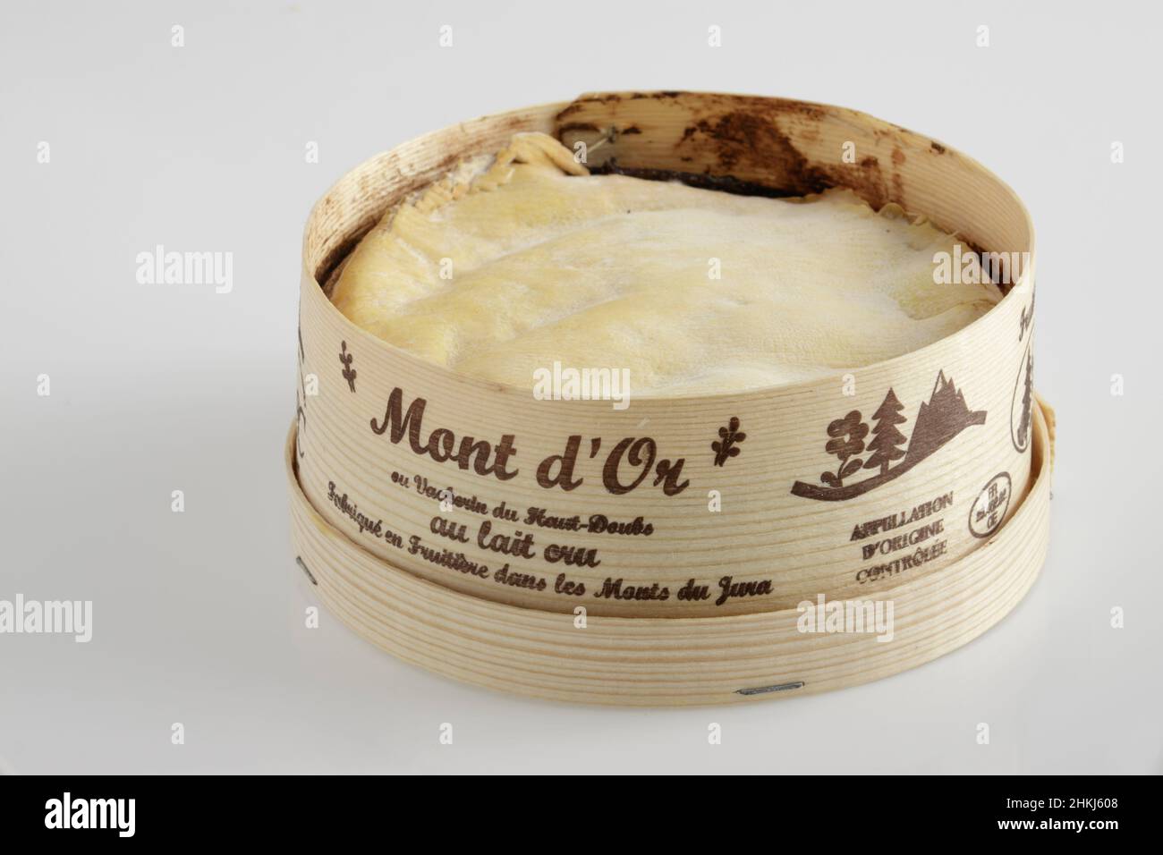 French Mont d'Or AOC cow's milk cheese in small wooden box Stock Photo ...