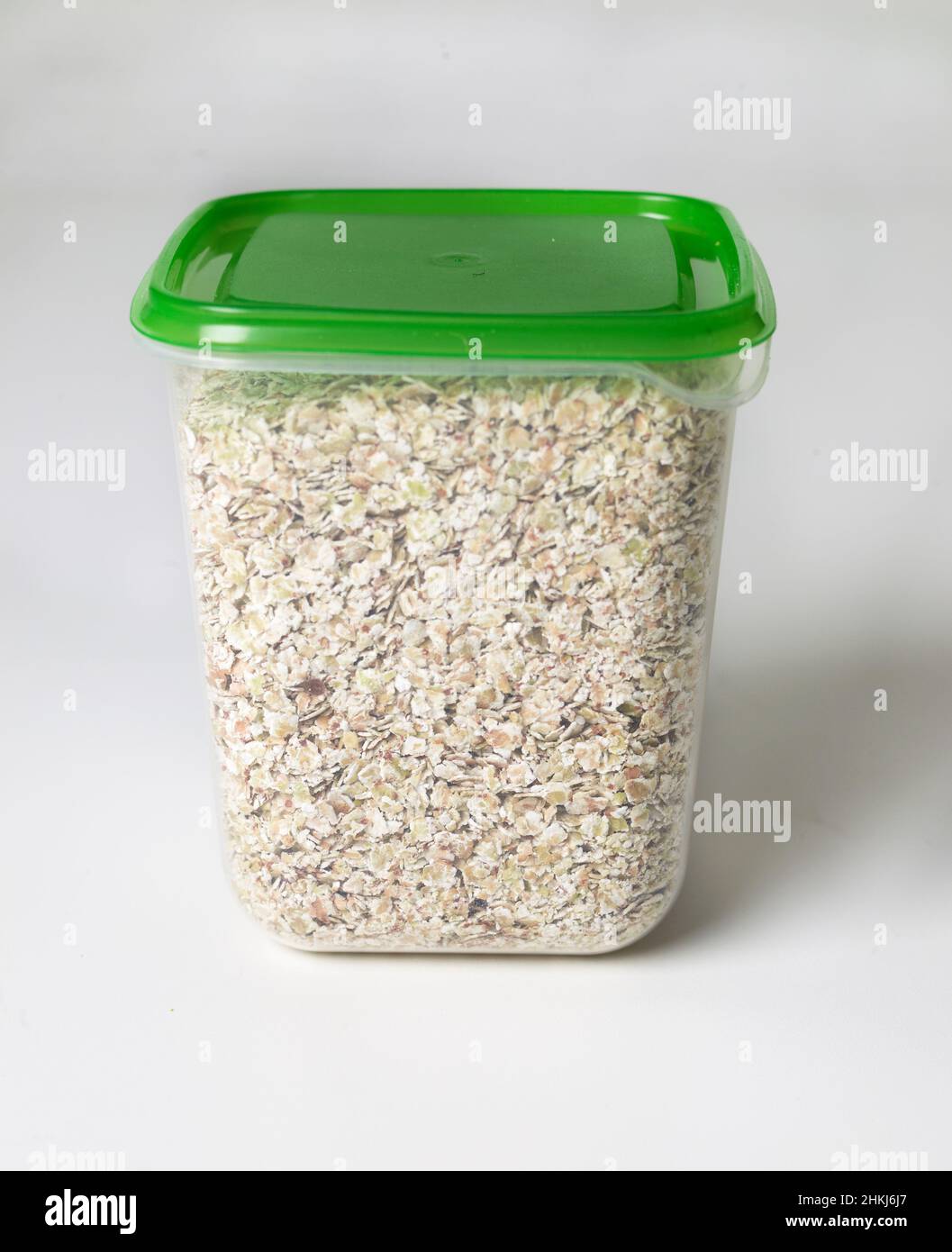 Gluten free oat bran in airtight plastic container Stock Photo - Alamy