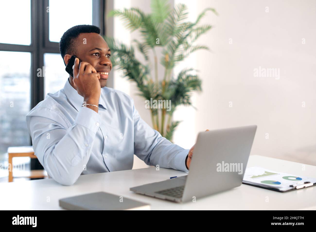 Successful confident busy African American business man, real estate ...