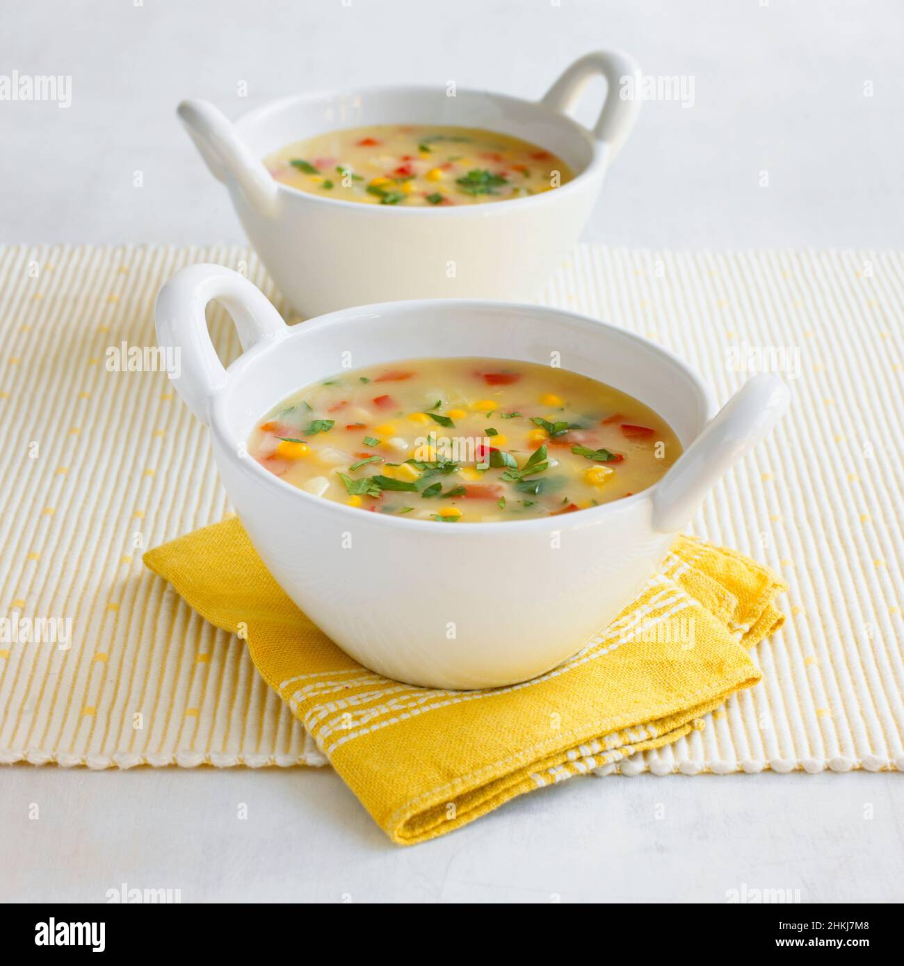 Bowls of cheese, red pepper and sweetcorn chowder Stock Photo - Alamy