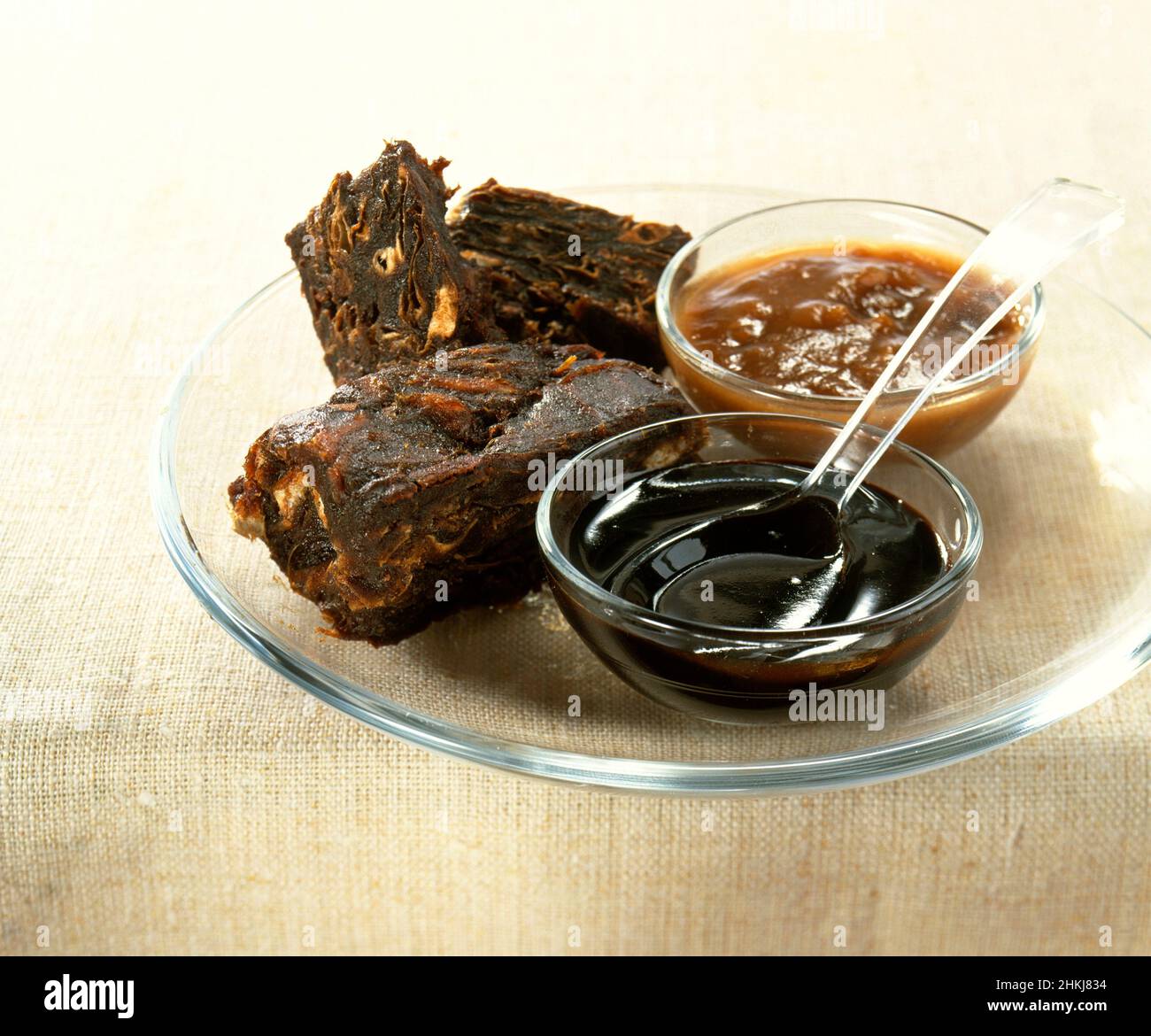 Tamarind (Tamarindus indica) blocks, concentrate and paste Stock Photo ...