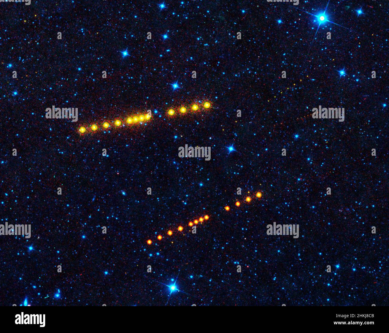 Asteroids Klotho and Lina, NEOWISE image Stock Photo - Alamy