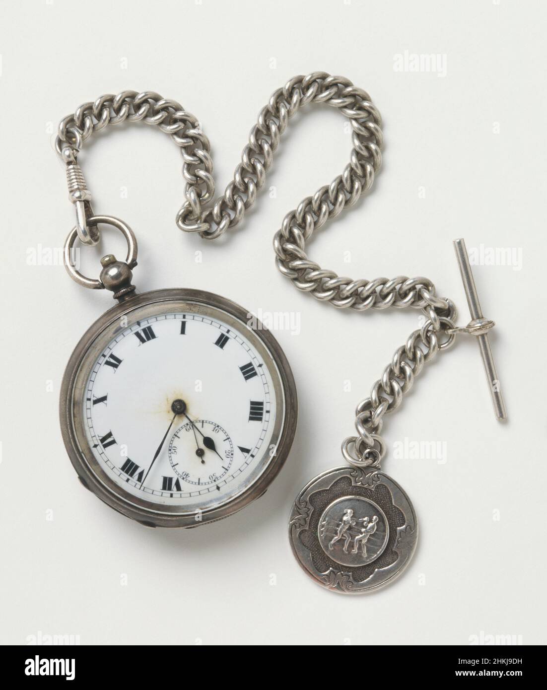 Pocket watch with roman numerals Stock Photo - Alamy