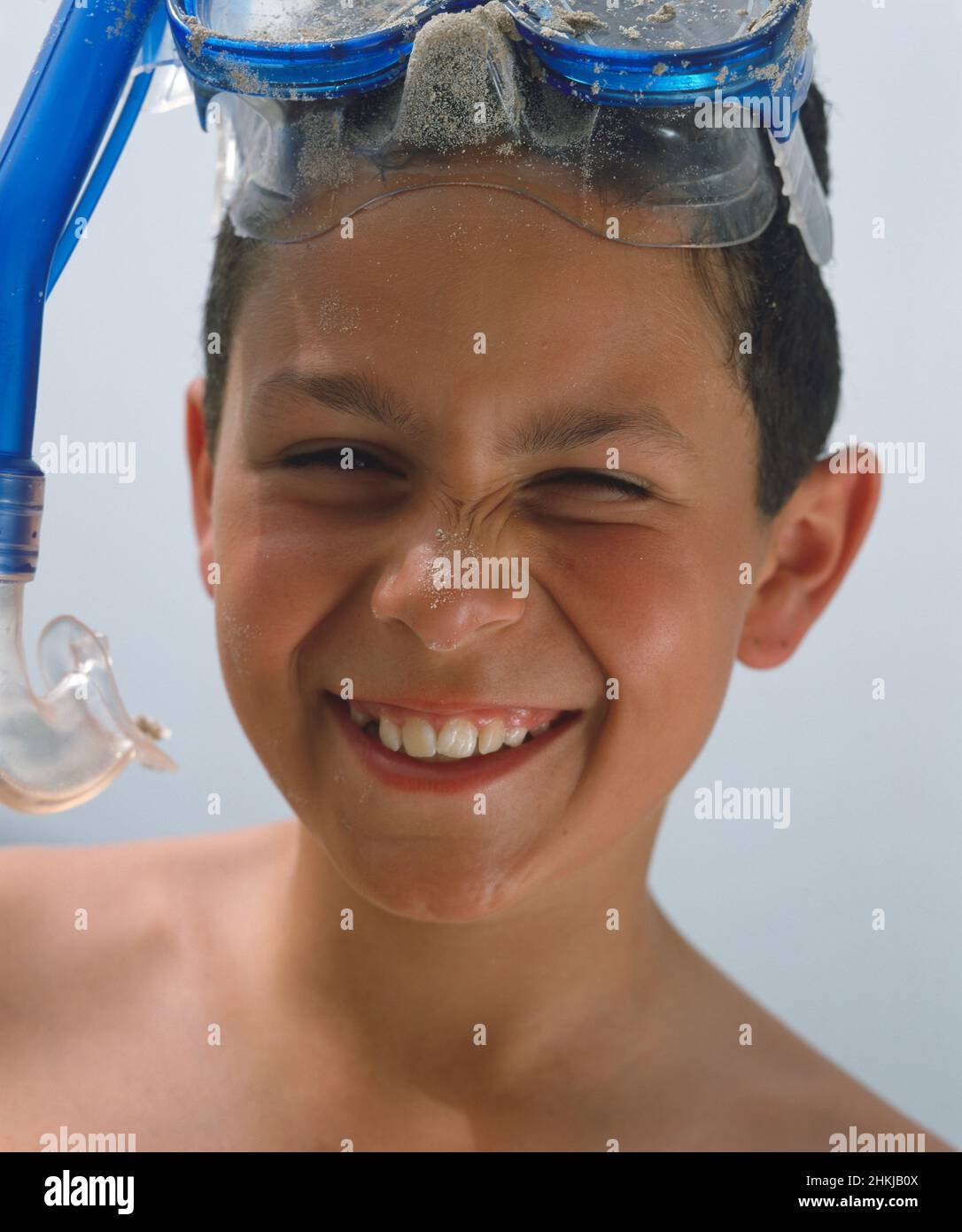 Smiling boy with snorkling mask and sand grains on his nose Stock Photo ...