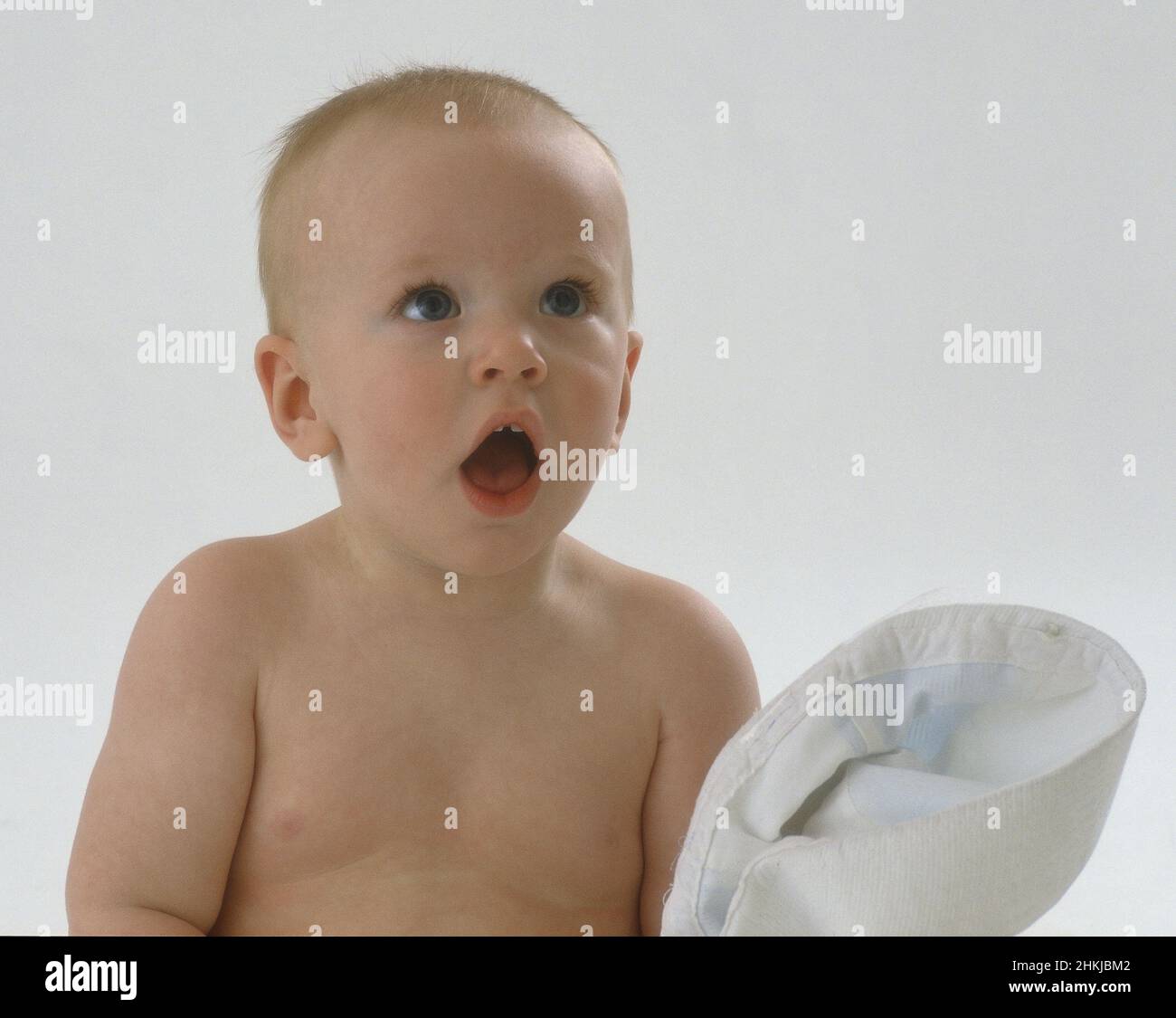 Baby with wide-open mouth and eyes Stock Photo - Alamy
