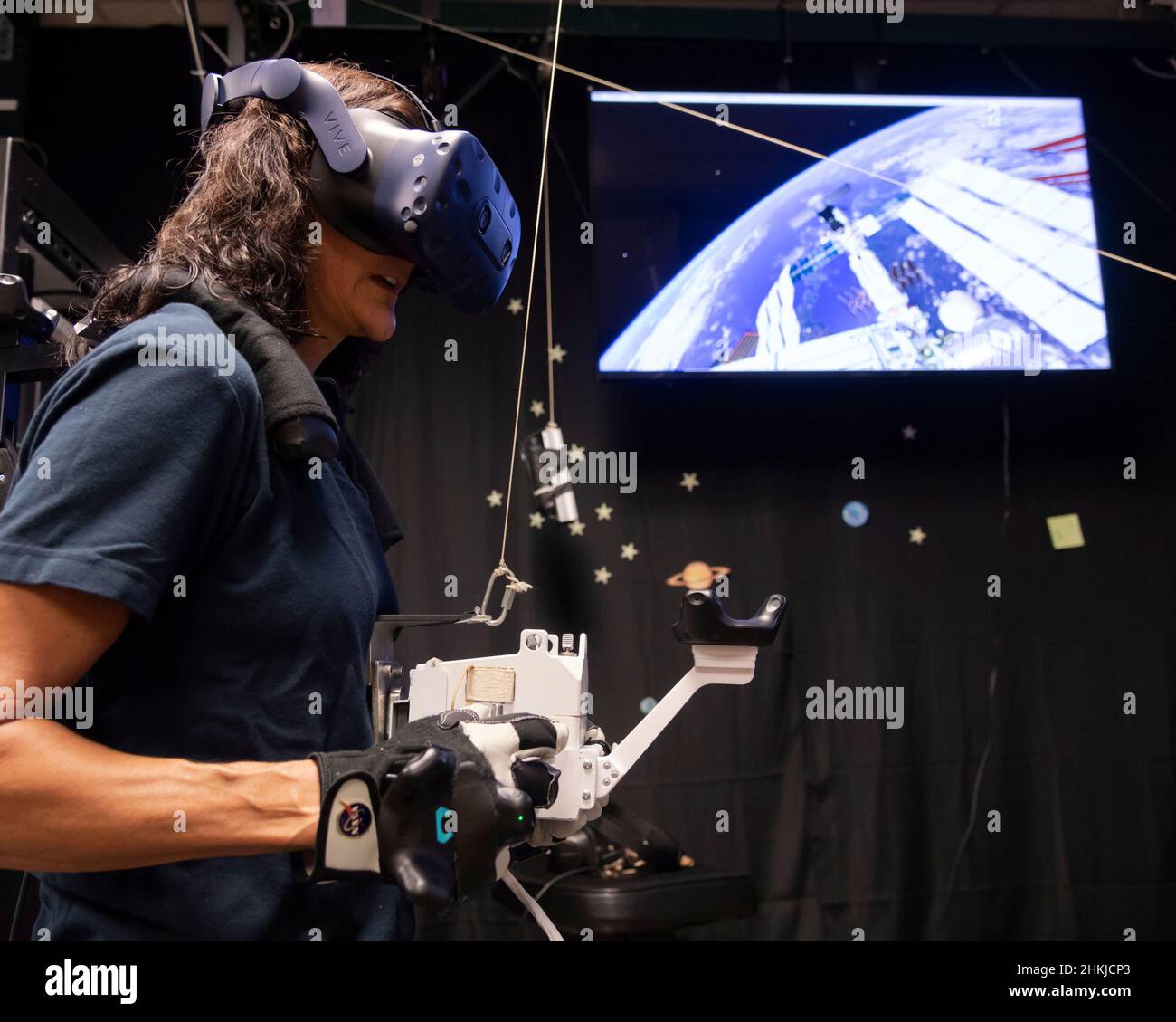 NASA astronaut practising spacewalk using virtual reality Stock Photo - Alamy