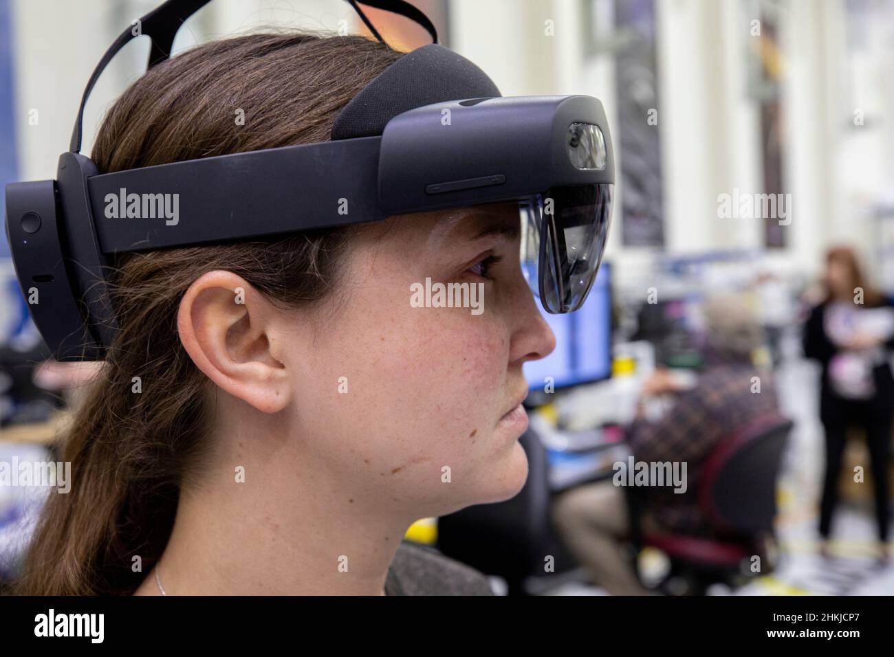 Technician using augmented reality goggles Stock Photo - Alamy