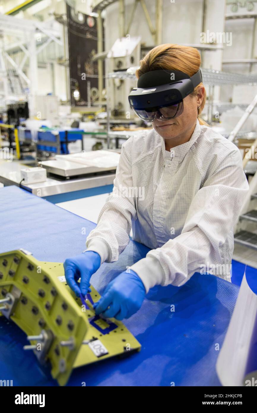 Technician using augmented reality goggles Stock Photo - Alamy