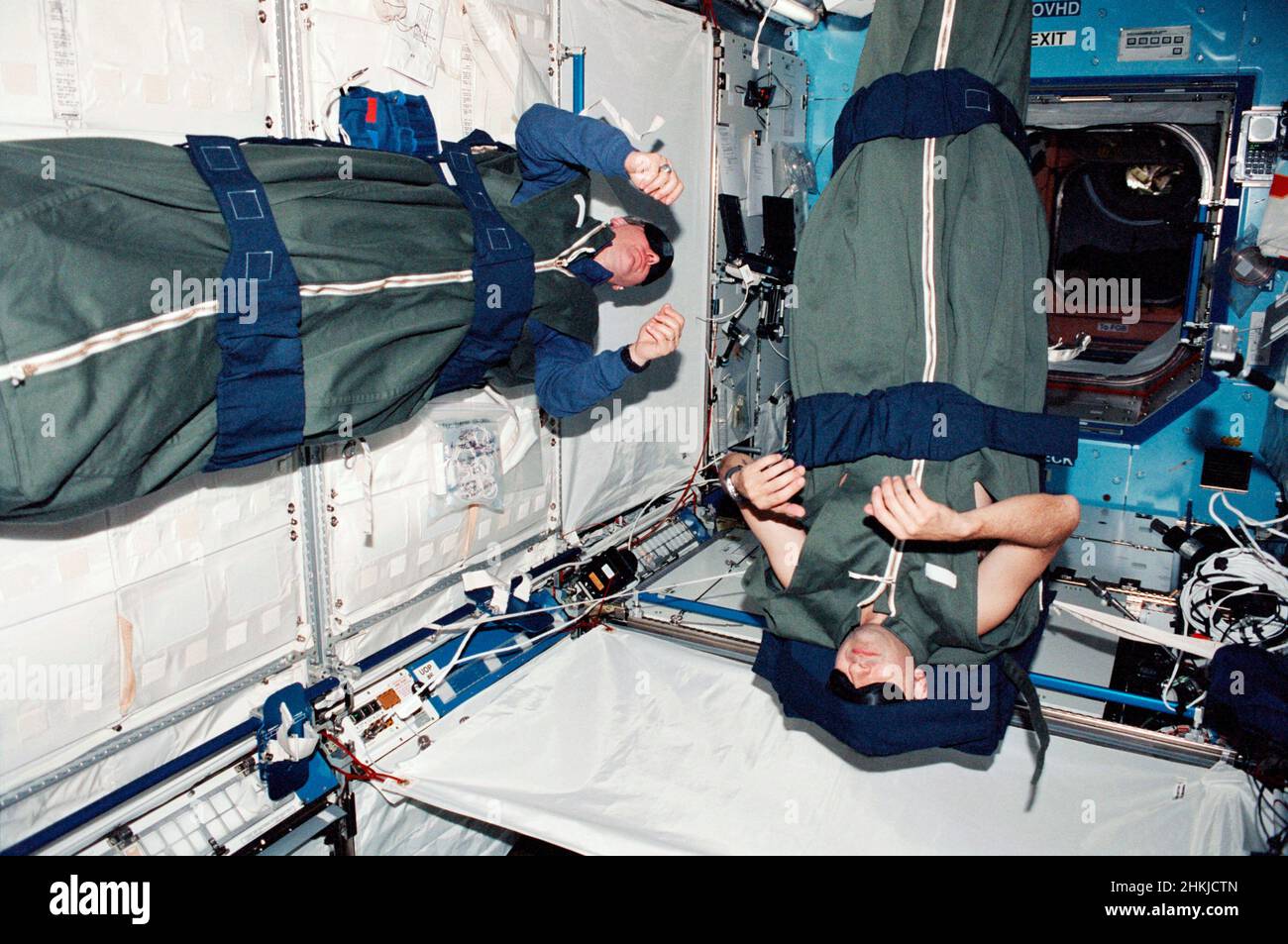 Astronauts sleeping on the ISS Stock Photo - Alamy