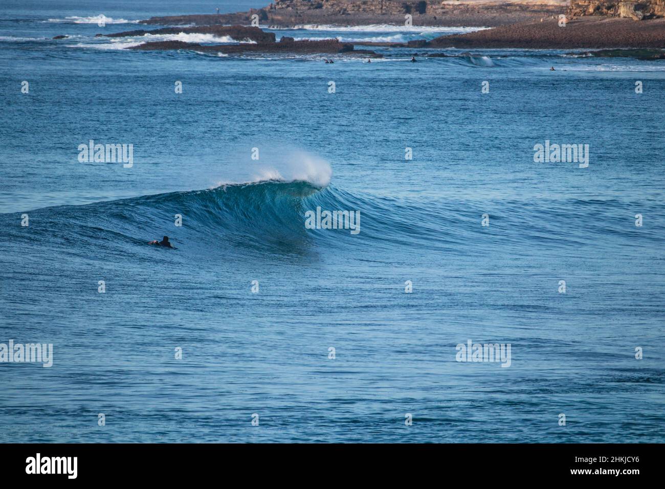 Perfect wave breaking in a beach. Surf spot Stock Photo - Alamy