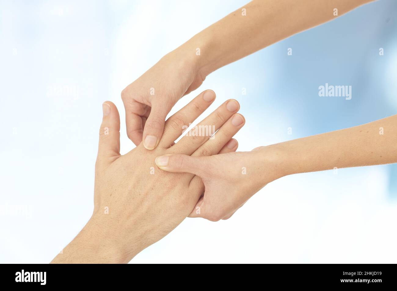 Pulling and pushing hand of recipient with flats of thumbs Stock Photo ...