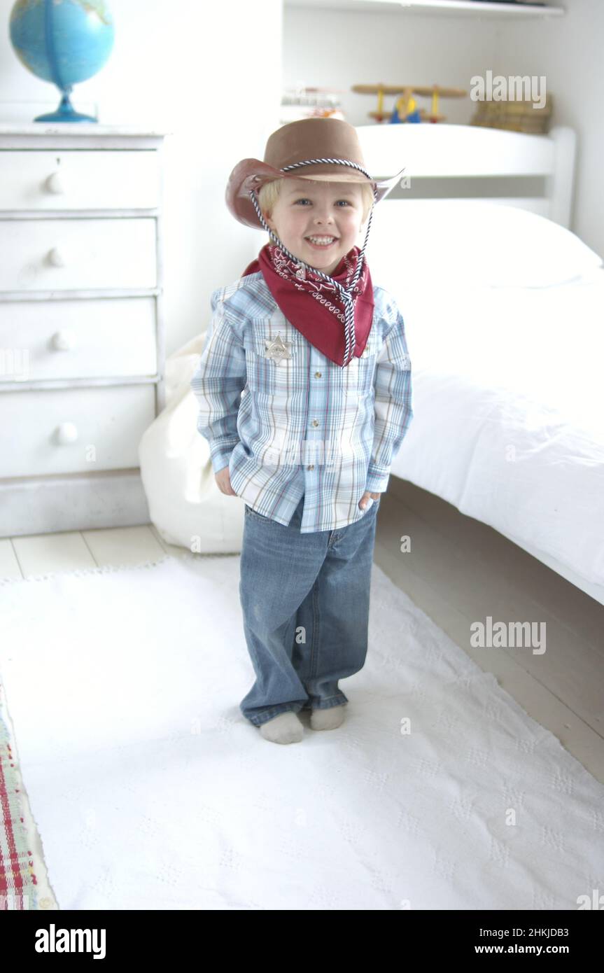 Boy dressed as cowboy Stock Photo - Alamy
