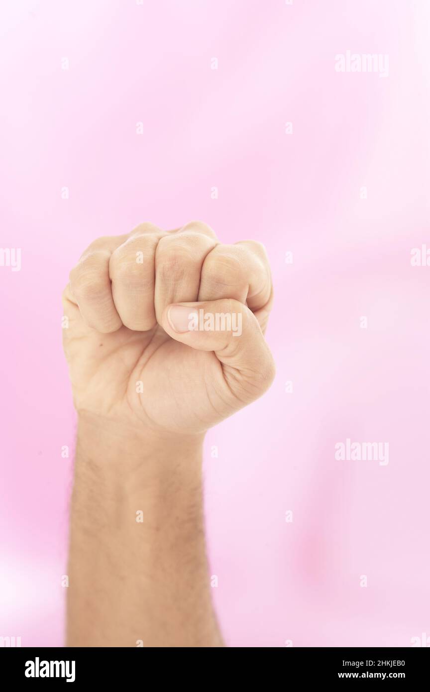 Curling fingers and thumb into fist and squeezing Stock Photo - Alamy