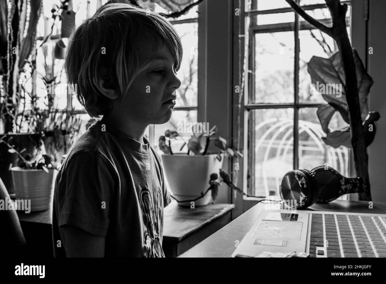 Virtual School Child Unhappy at computer Stock Photo - Alamy