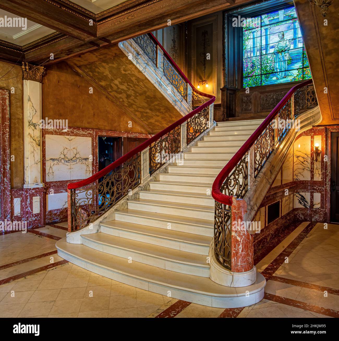 Marble stairway leading toward Tiffany stained glass window at ... Marble stairway leading toward Tiffany stained glass window at ...