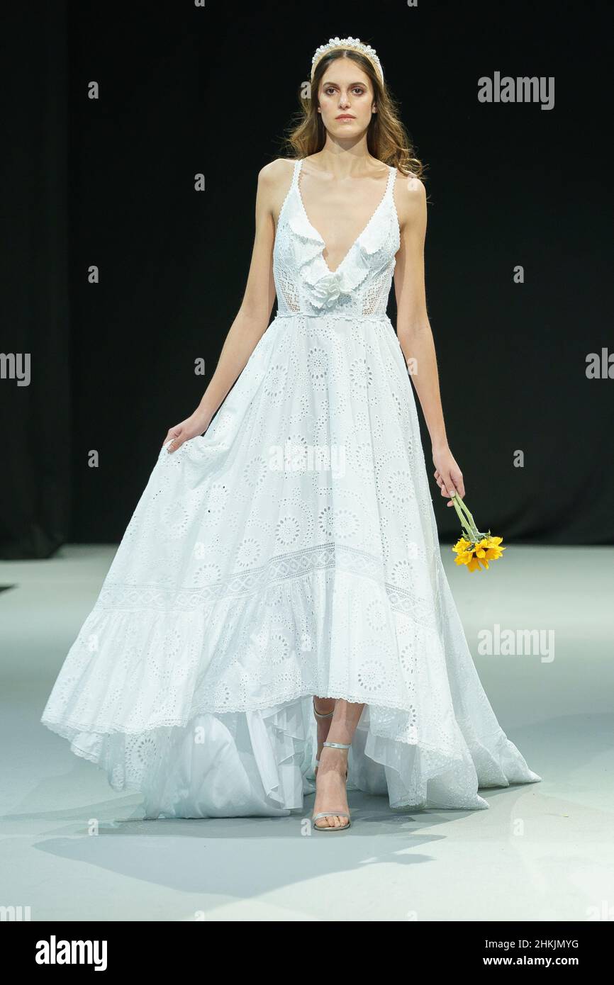 A model walks the runway designed by the adlib ibiza fashion show brand at the Momad fashion ...