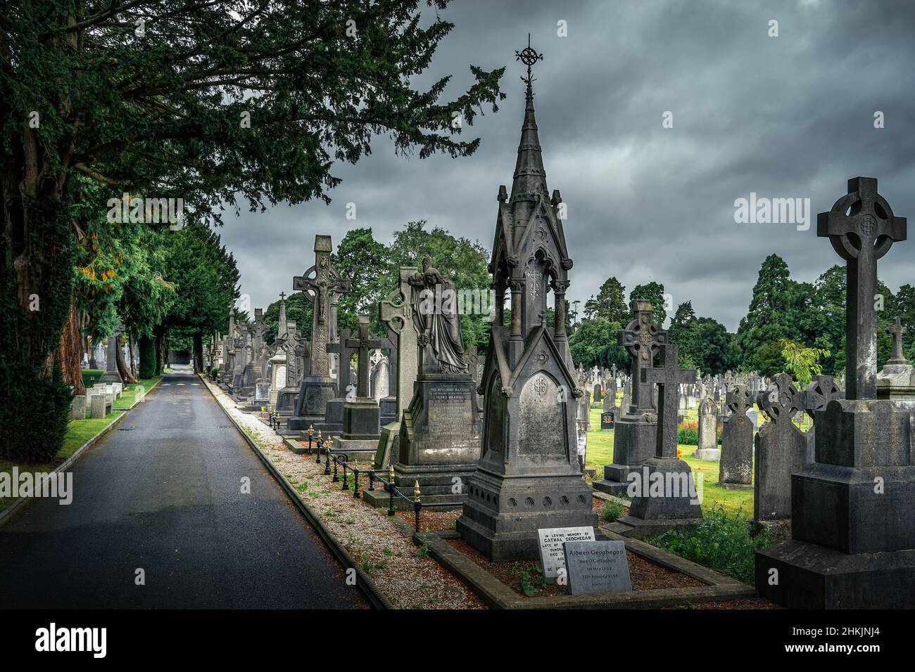 Dublin, Ireland, August 2019 Ancient graves with Celtic crosses and ...