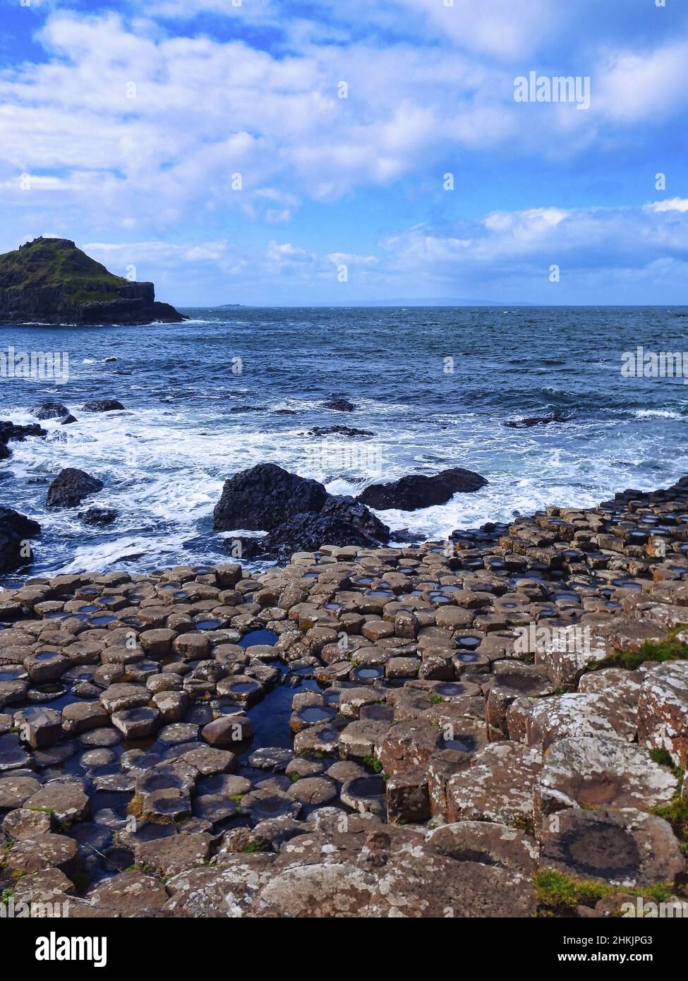 Landscape of Giant's Causeway trail with a blue sky in summer in ...