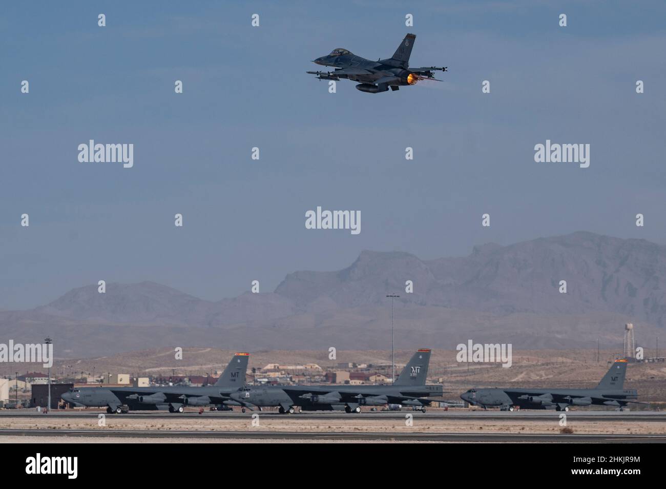 An F-16 Fighting Falcon assigned to the 64th Aggressor Squadron, takes ...