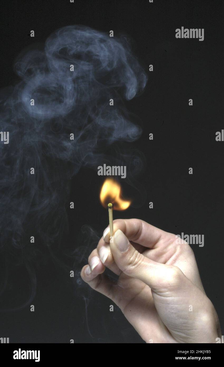 burning match in a hand Stock Photo - Alamy