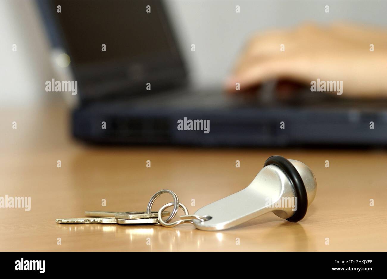 hotel room keys lying on the table, laptop in the background, Germany ...