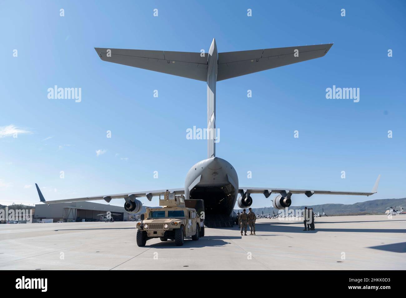 Airmen with the 21st Airlift Squadron and Marines assigned to 5th ...