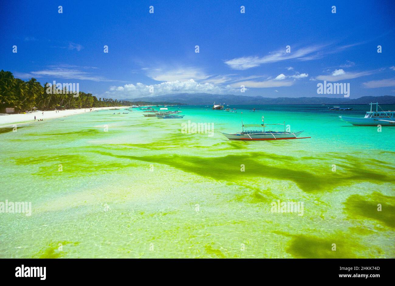 The famous sandy shore, vibrant white sands and shallow pastel waters ...