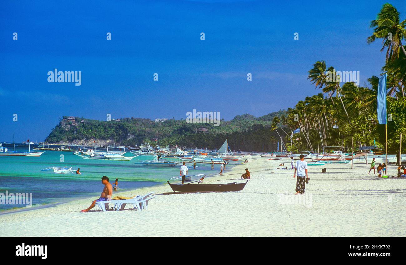The famous sandy shore, vibrant white sands and shallow pastel waters ...