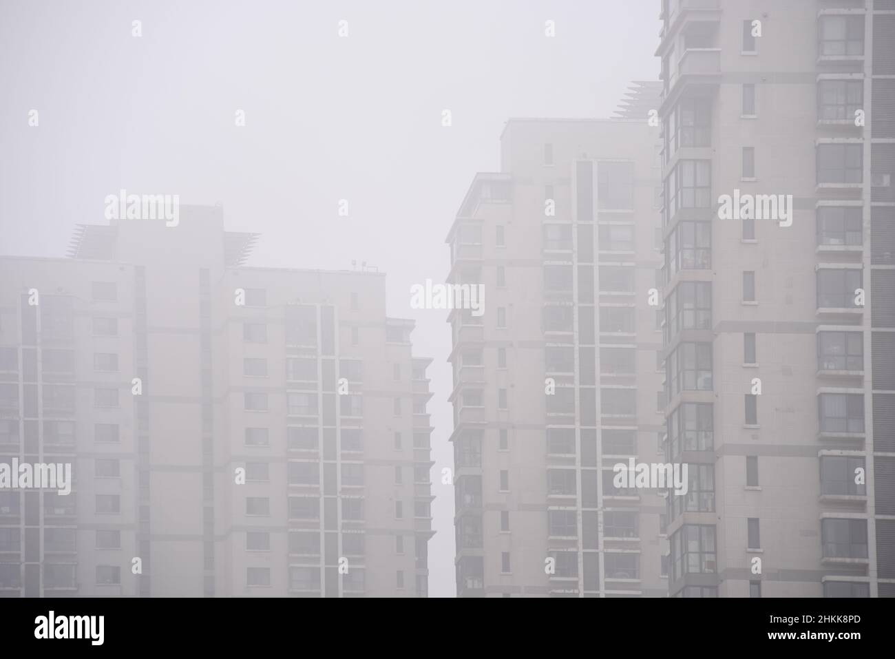Beautiful view of buildings in a foggy weather Stock Photo - Alamy
