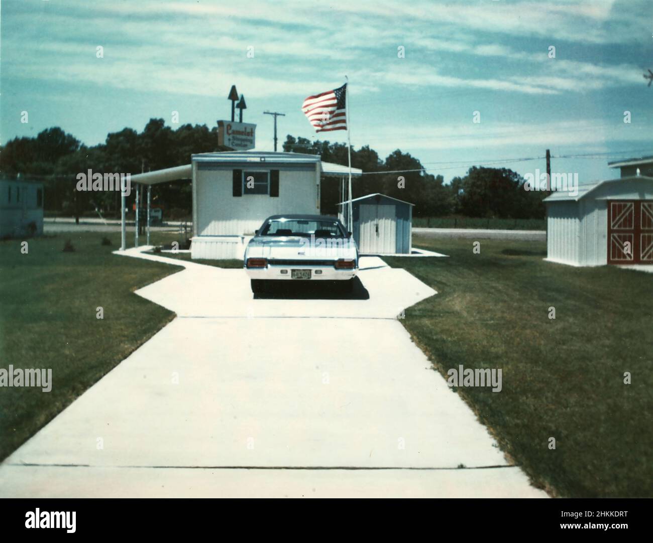 Abstract view of a car and mobile home in a trailer park in Indiana, ca ...