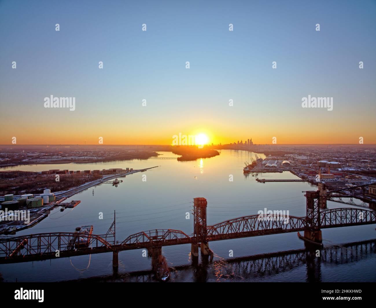 Aerial View of Sunset over City of Philadelphia with Delair Railroad ...