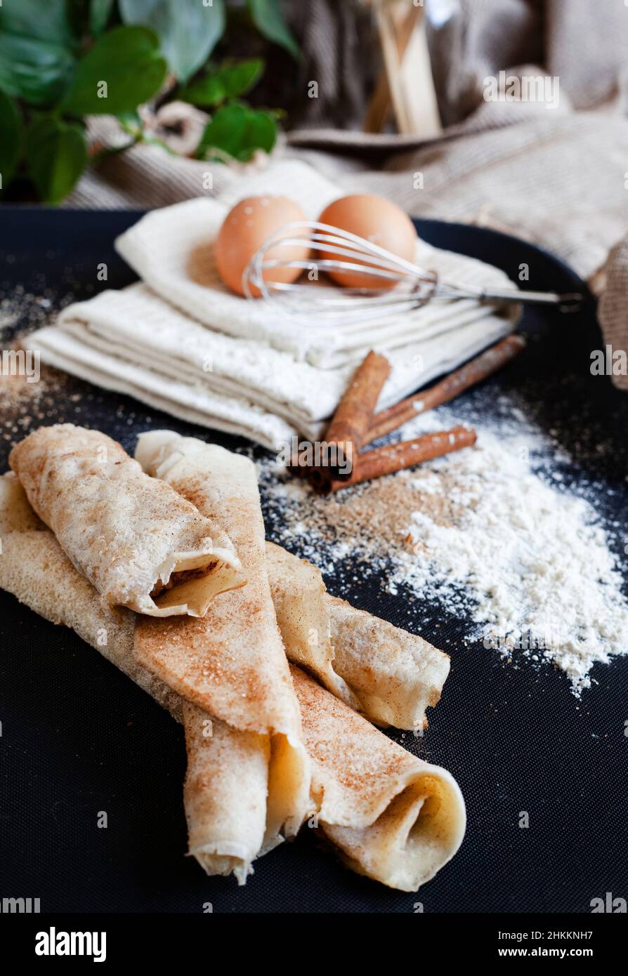 South African sweet cinnamon and sugar pancakes or “pannekoek” Stock ...