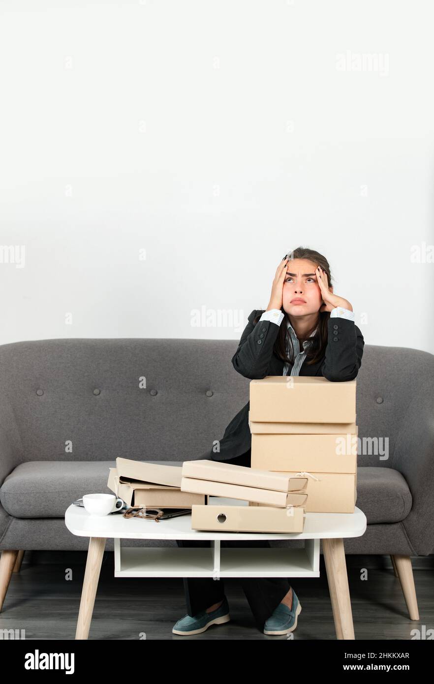 Busy business woman, secretary girl working alone late in office. Angry ...