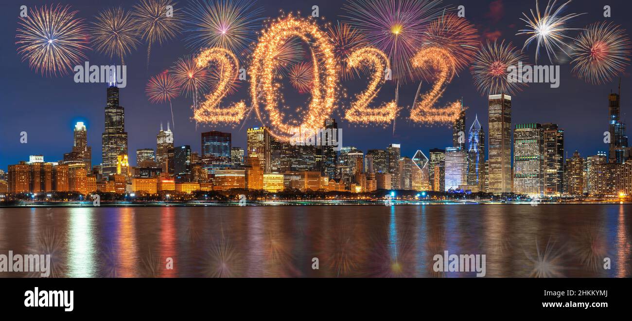2022 written with Sparkle firework with multicolor of fireworks on ...